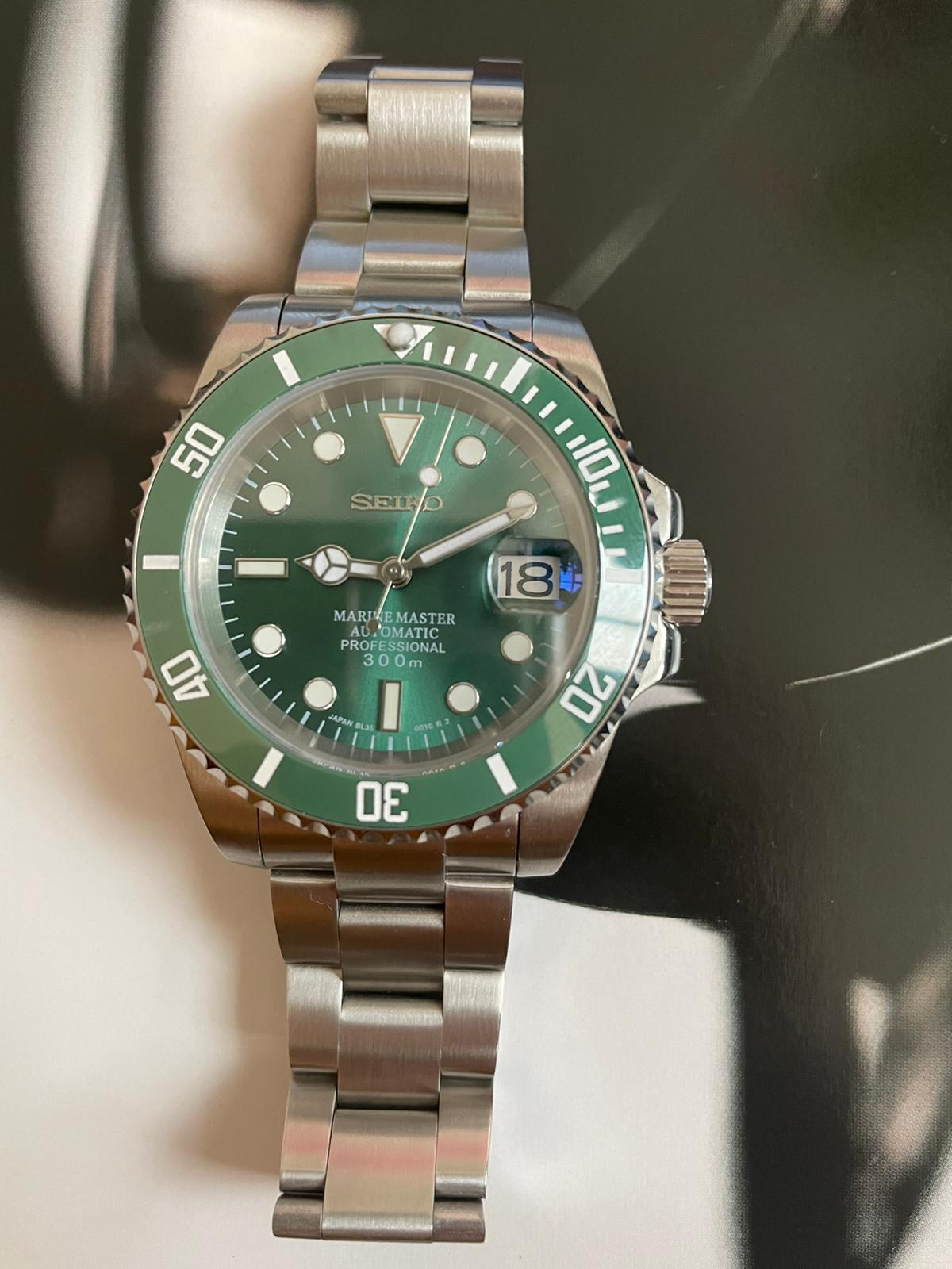 Green ceramic bezel sunburst green dial automatic watch – Lovetomodwatches